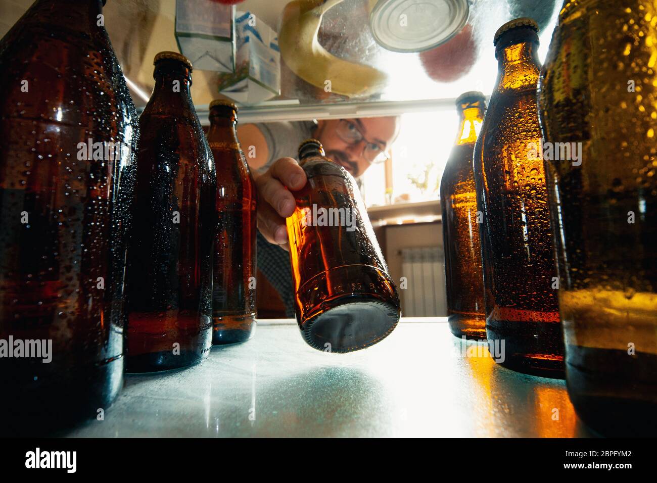 Drinking man grabbing hi-res stock photography and images - Alamy