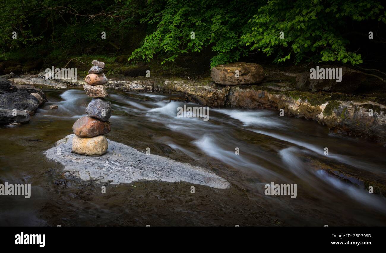 Stone stacking on the Afon Twrch Stock Photo - Alamy