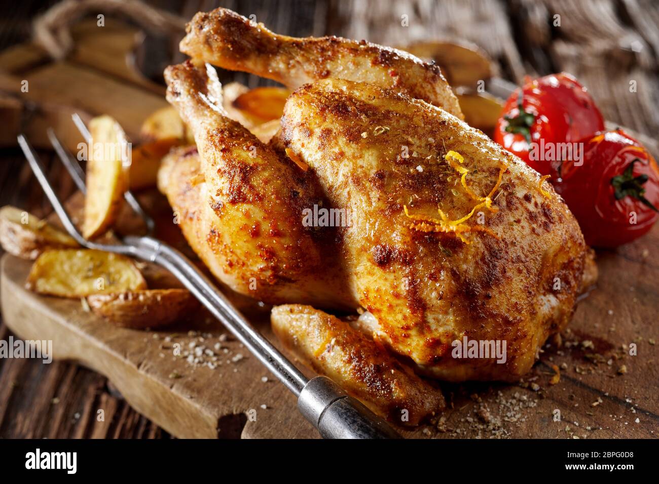 Grilled seasoned young poussin chicken, or spring chicken, served whole ...