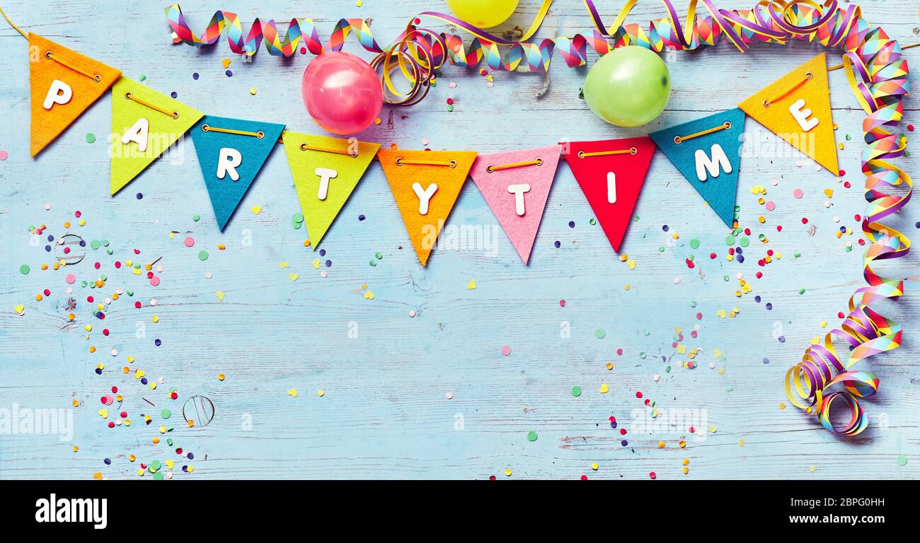 Festive Party Time banner with copy space and a border of colorful ...