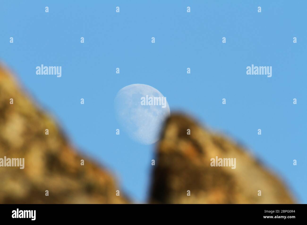 Moon between two rocks hi-res stock photography and images - Alamy