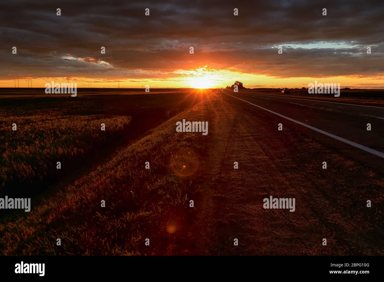 Background night track with sunset Stock Photo - Alamy
