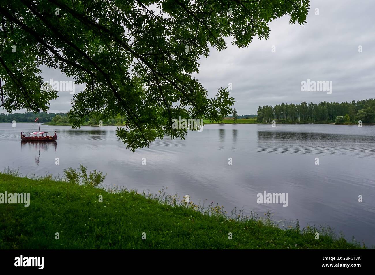 Tourist boat in the style of viking on river Daugava, Latvia. Ancient ...