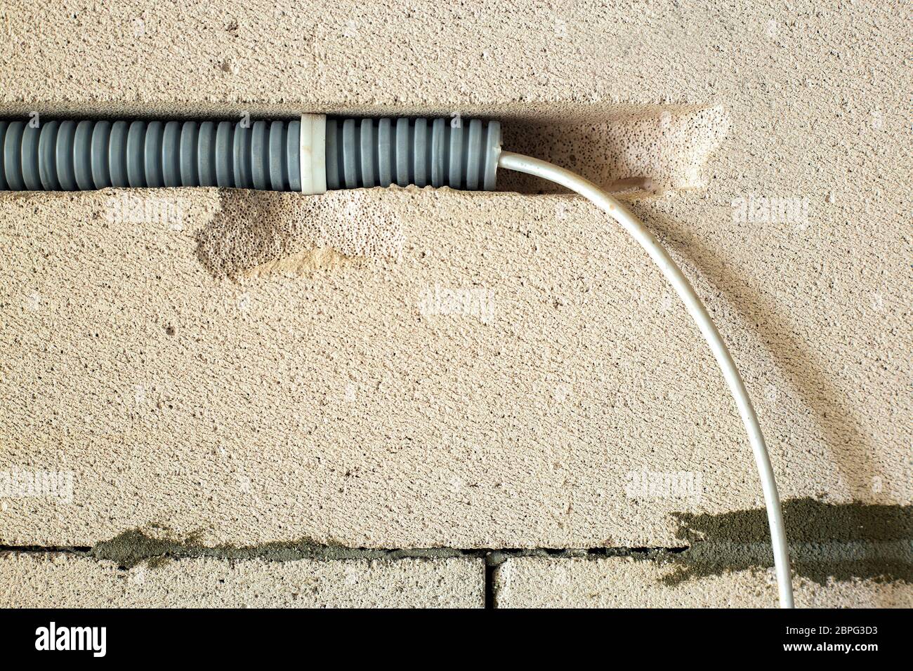 Electrical cables laid in protective corrugation installed on the ...