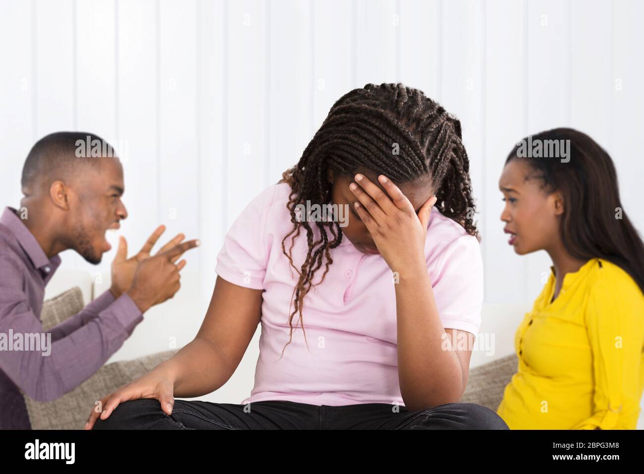 Parents argue in front of children hi-res stock photography and images ...