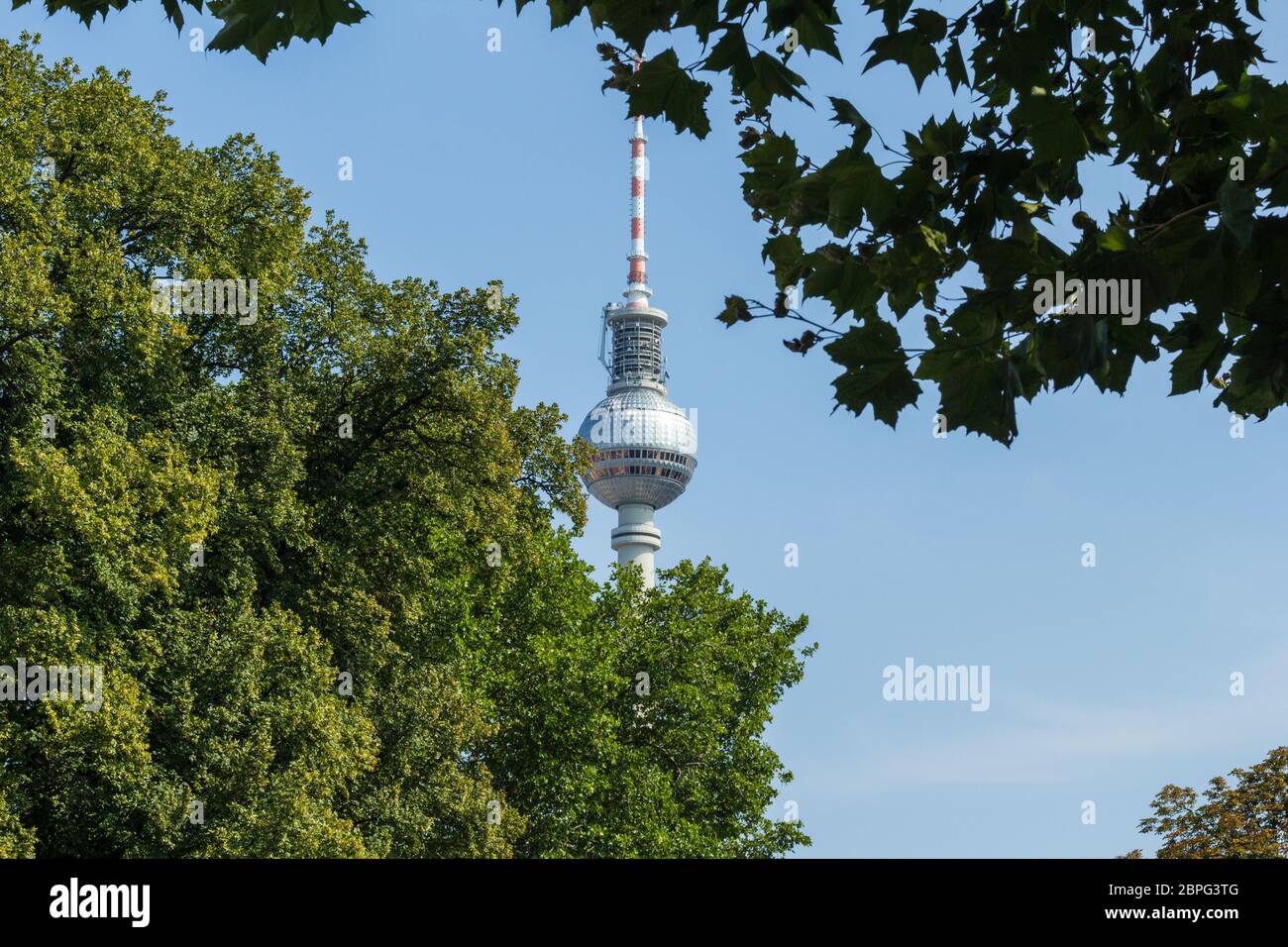 View of the Berlin television tower from the beautiful park at the ...