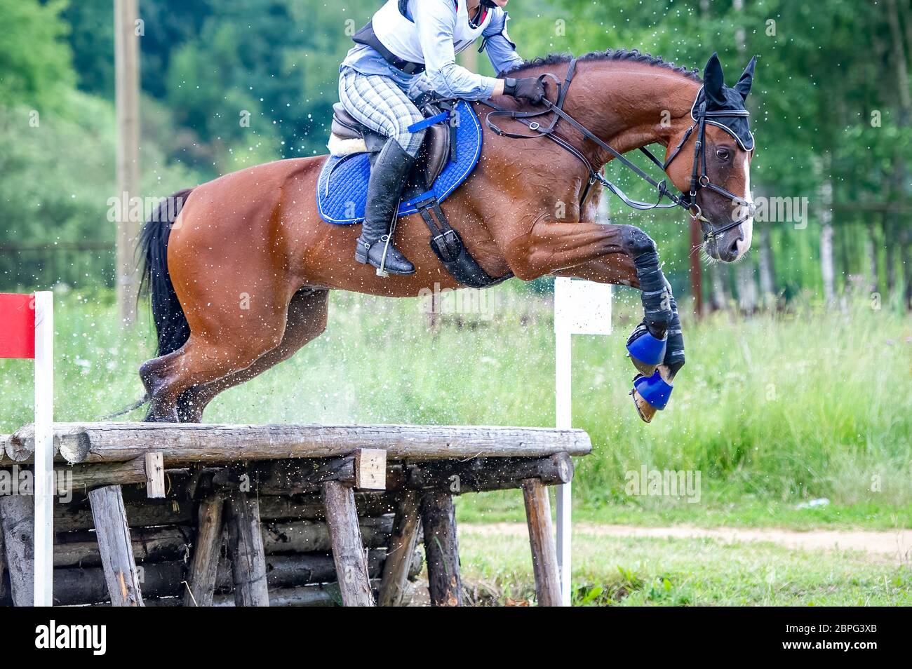 Jumping a log fence hi-res stock photography and images - Alamy