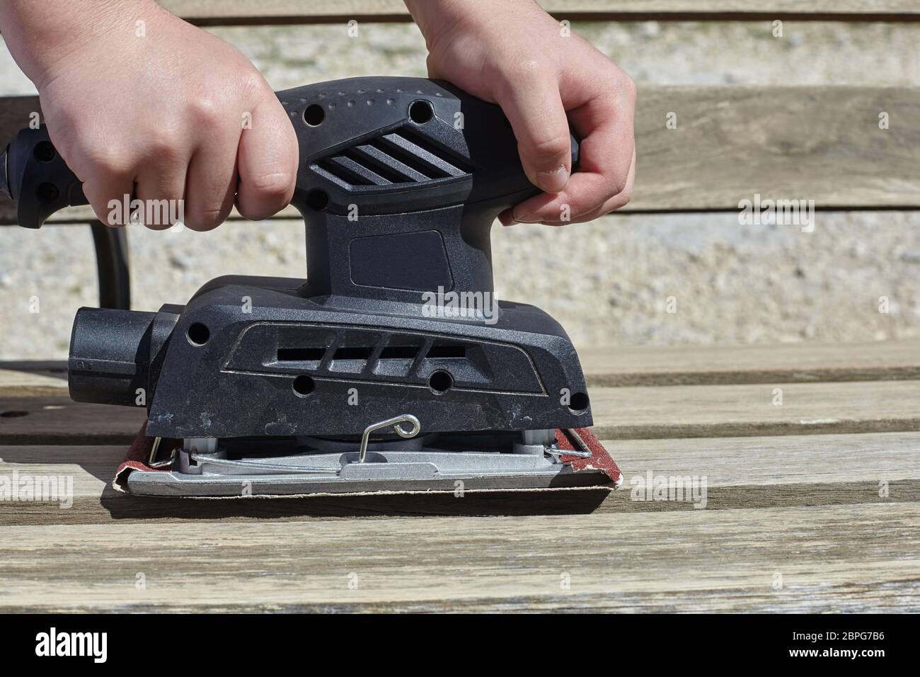 rubbing wood with a machine Stock Photo - Alamy
