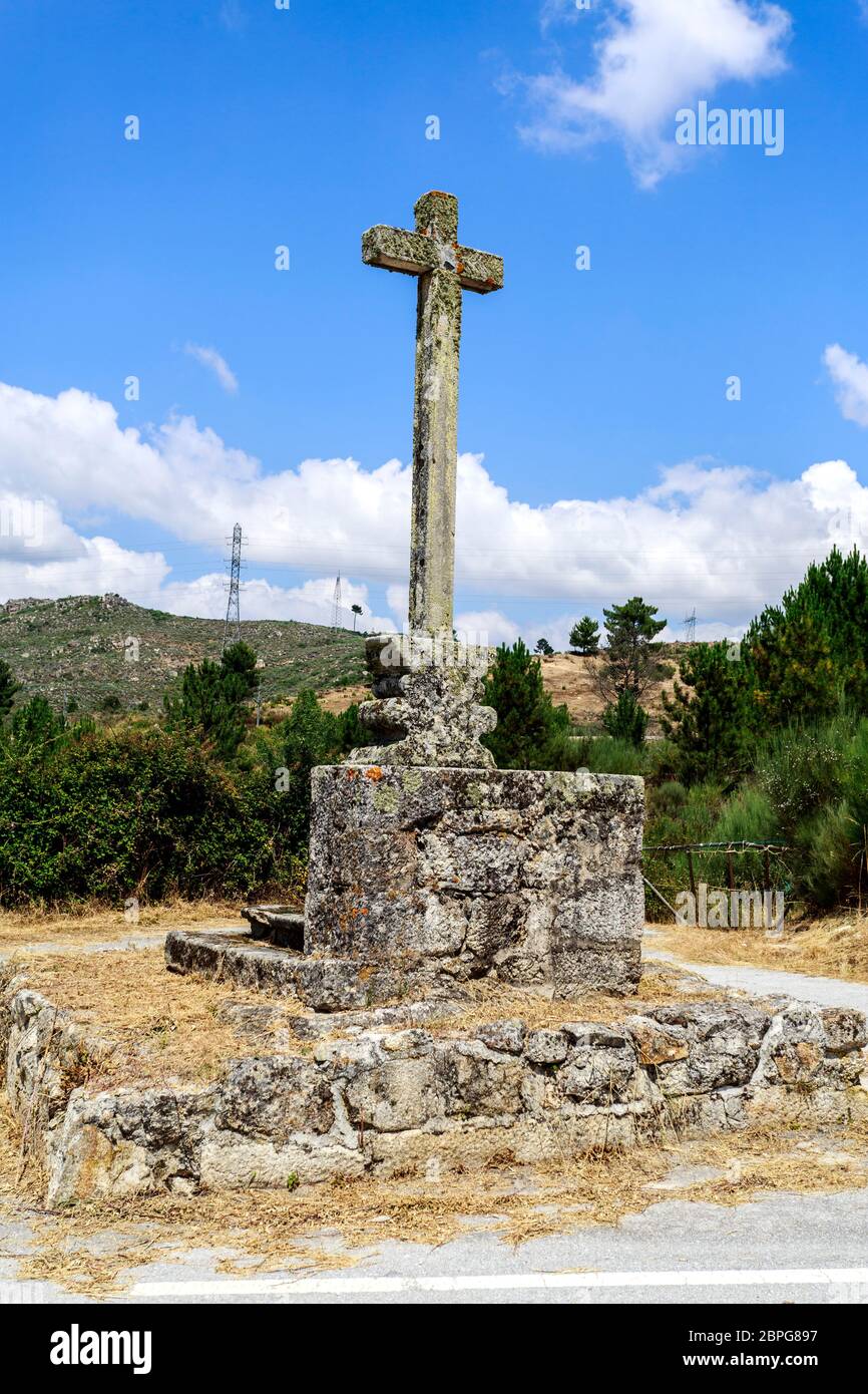 Detail of the stone Latin cross ornamented with vegetable decoration ...