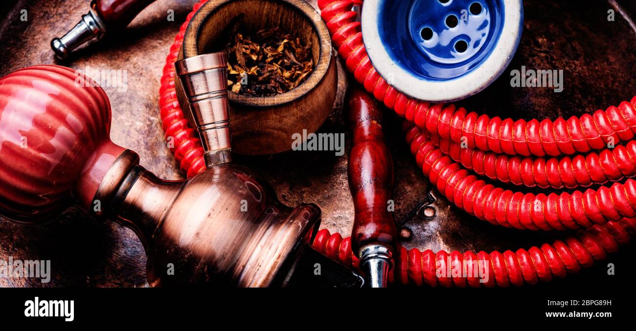 Oriental exotic hookah .Smoking turkish shisha.Tobacco in a snuffbox ...