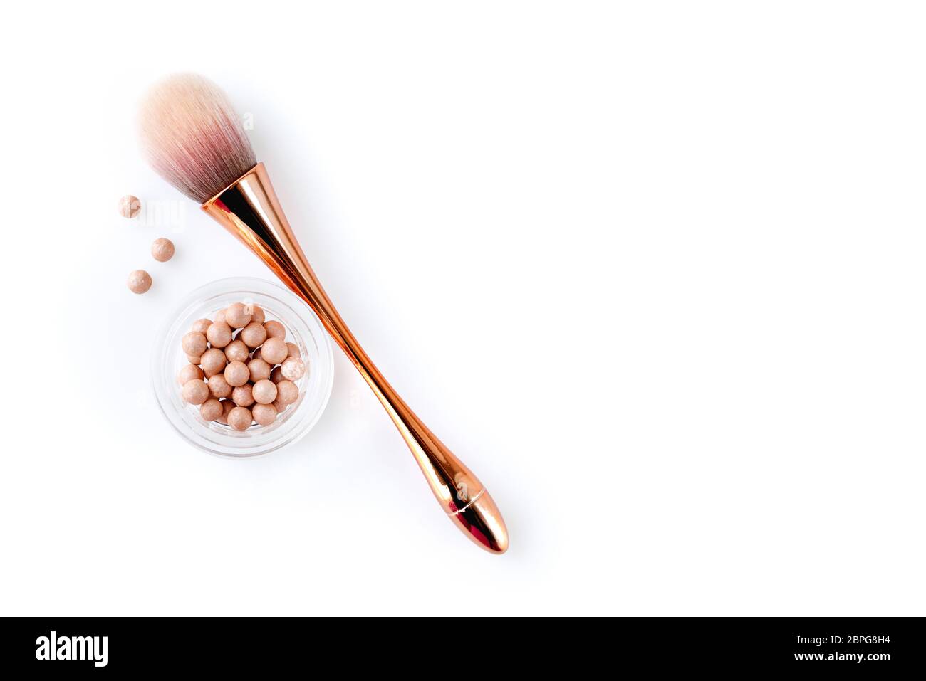 Cosmetic powder balls and makeup brush, isolated on white background ...