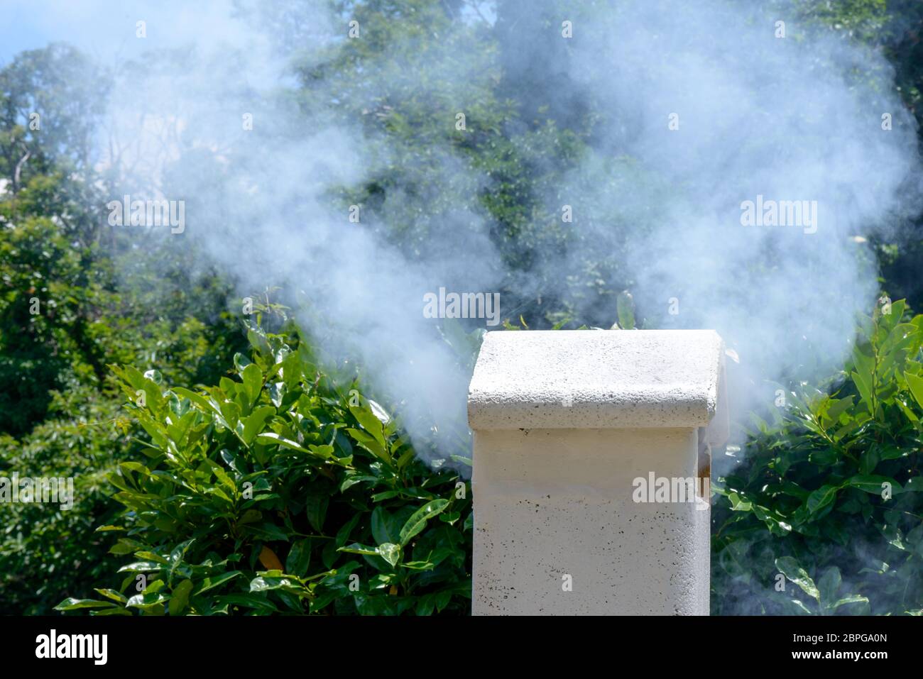 smoke coming from the chimney of the barbecue Stock Photo - Alamy