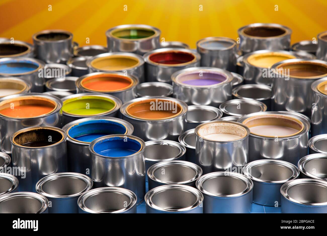 Full Buckets of rainbow colored oil paint Stock Photo - Alamy