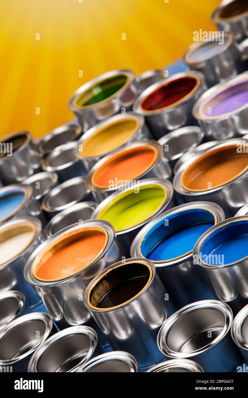 Concept group of tin metal cans with color paint Stock Photo - Alamy