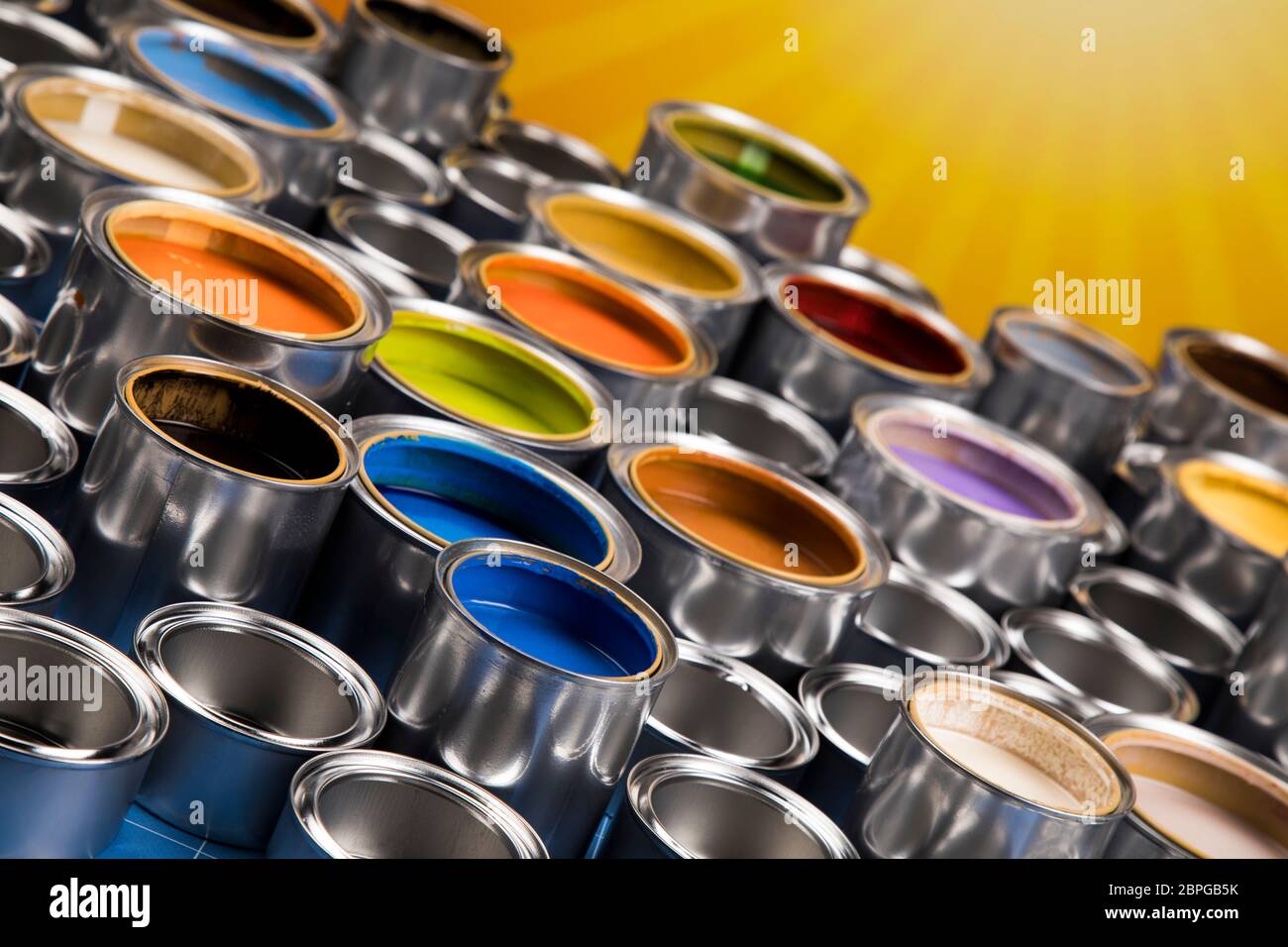 Concept group of tin metal cans with color paint Stock Photo - Alamy