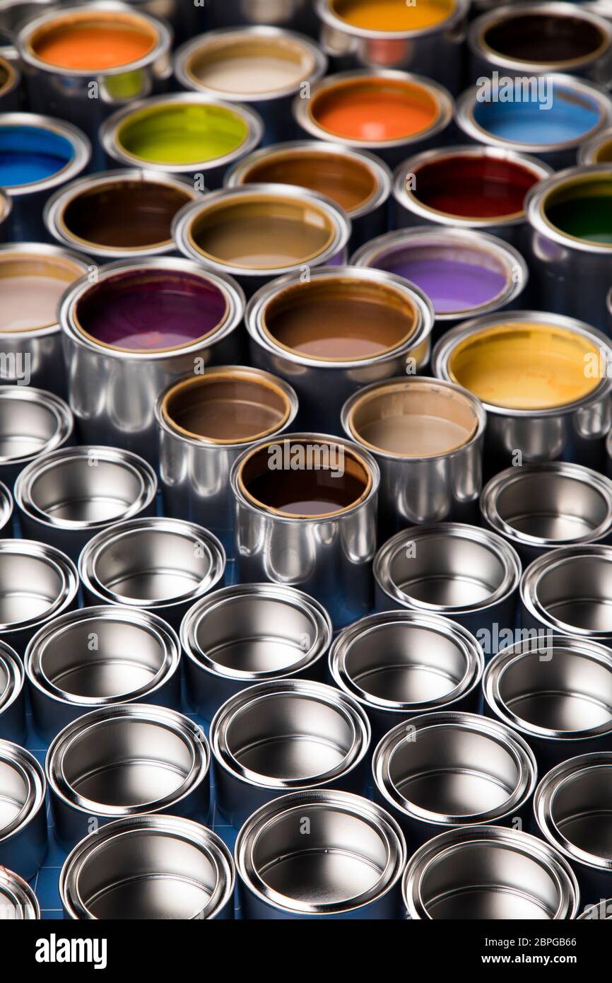 Metal cans with color paint Stock Photo - Alamy