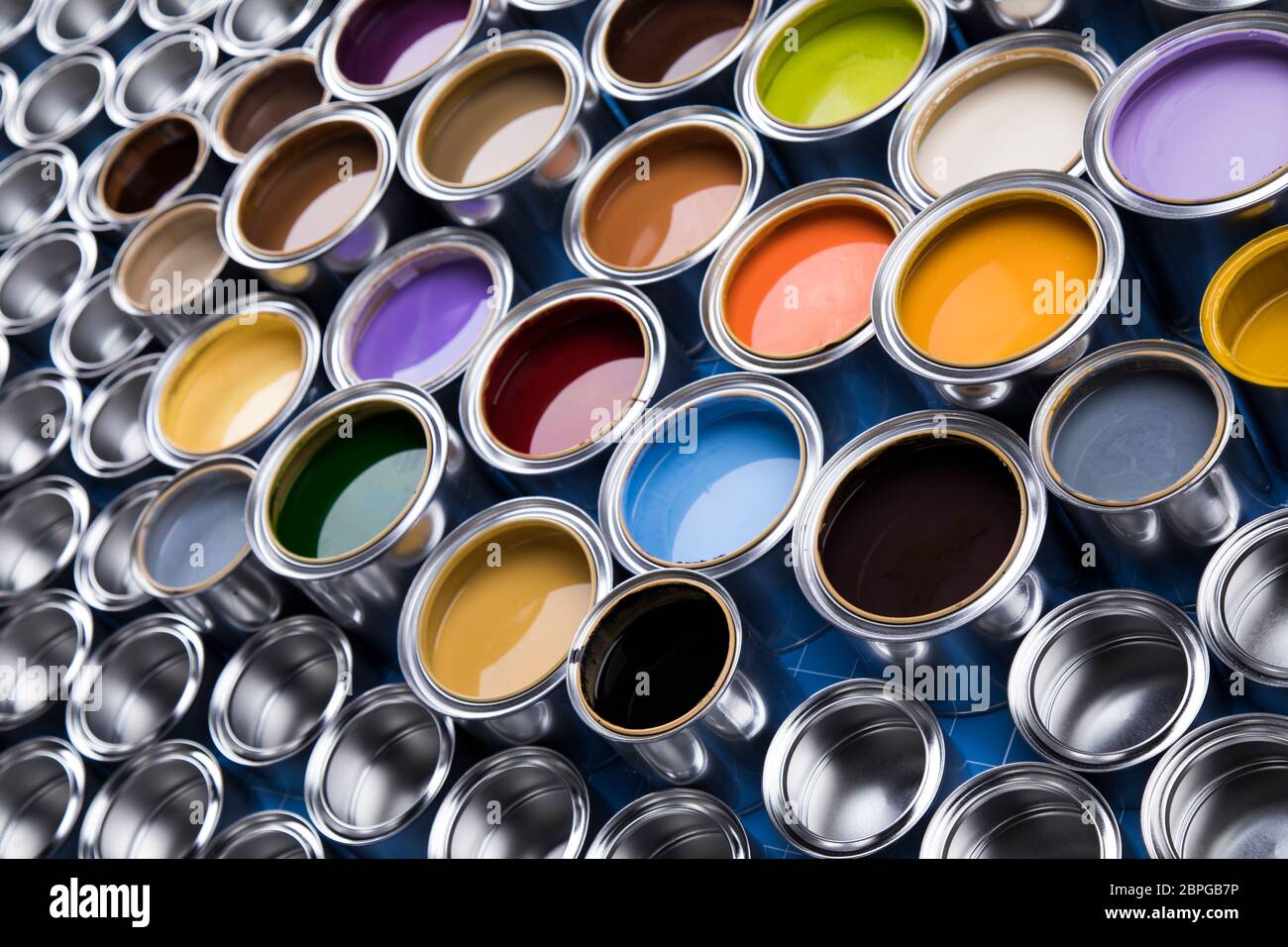 Concept group of tin metal cans with color paint Stock Photo - Alamy