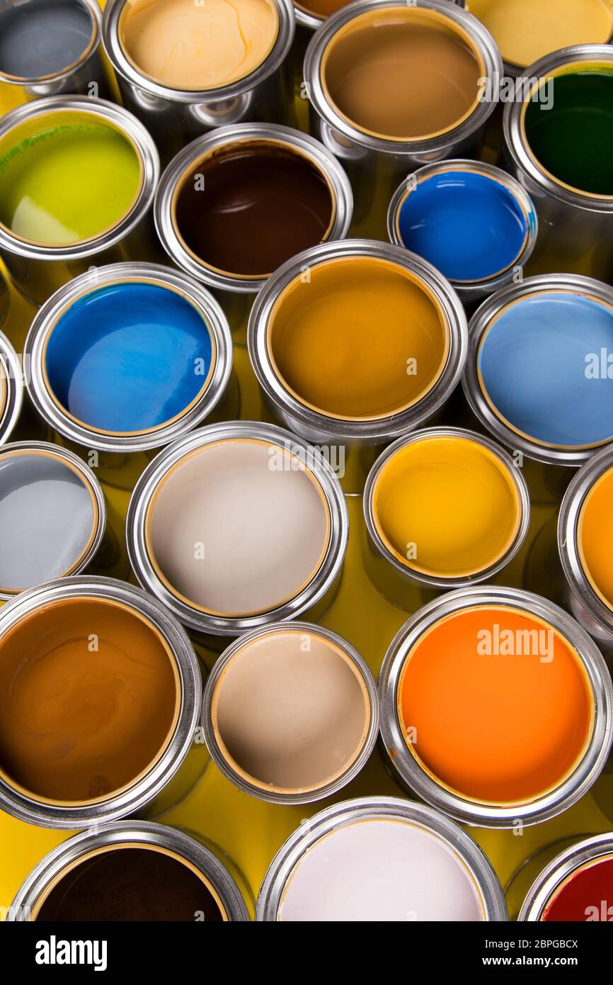 Paint cans color palette, yellow background Stock Photo - Alamy