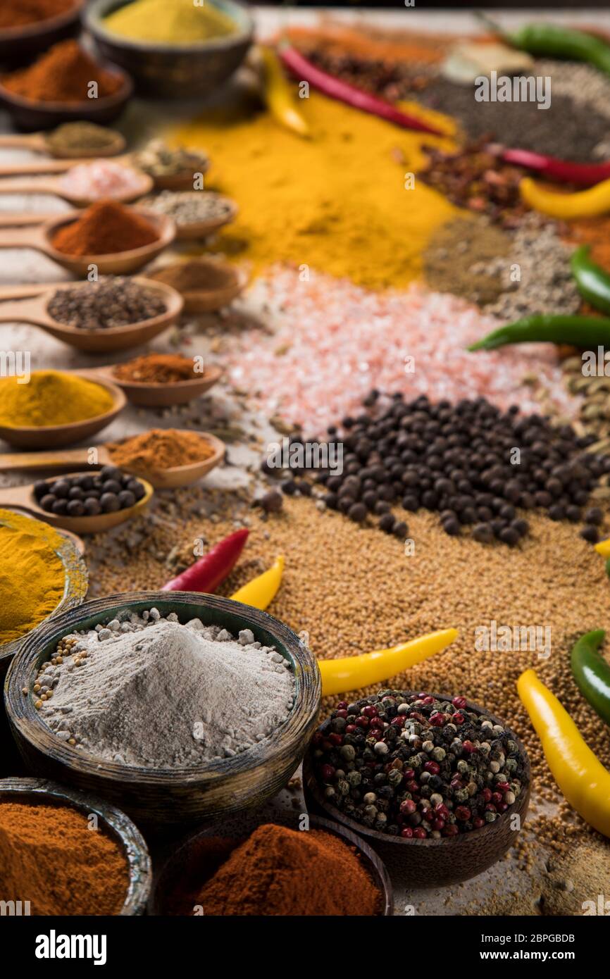 Cookbook and various spices background Stock Photo - Alamy