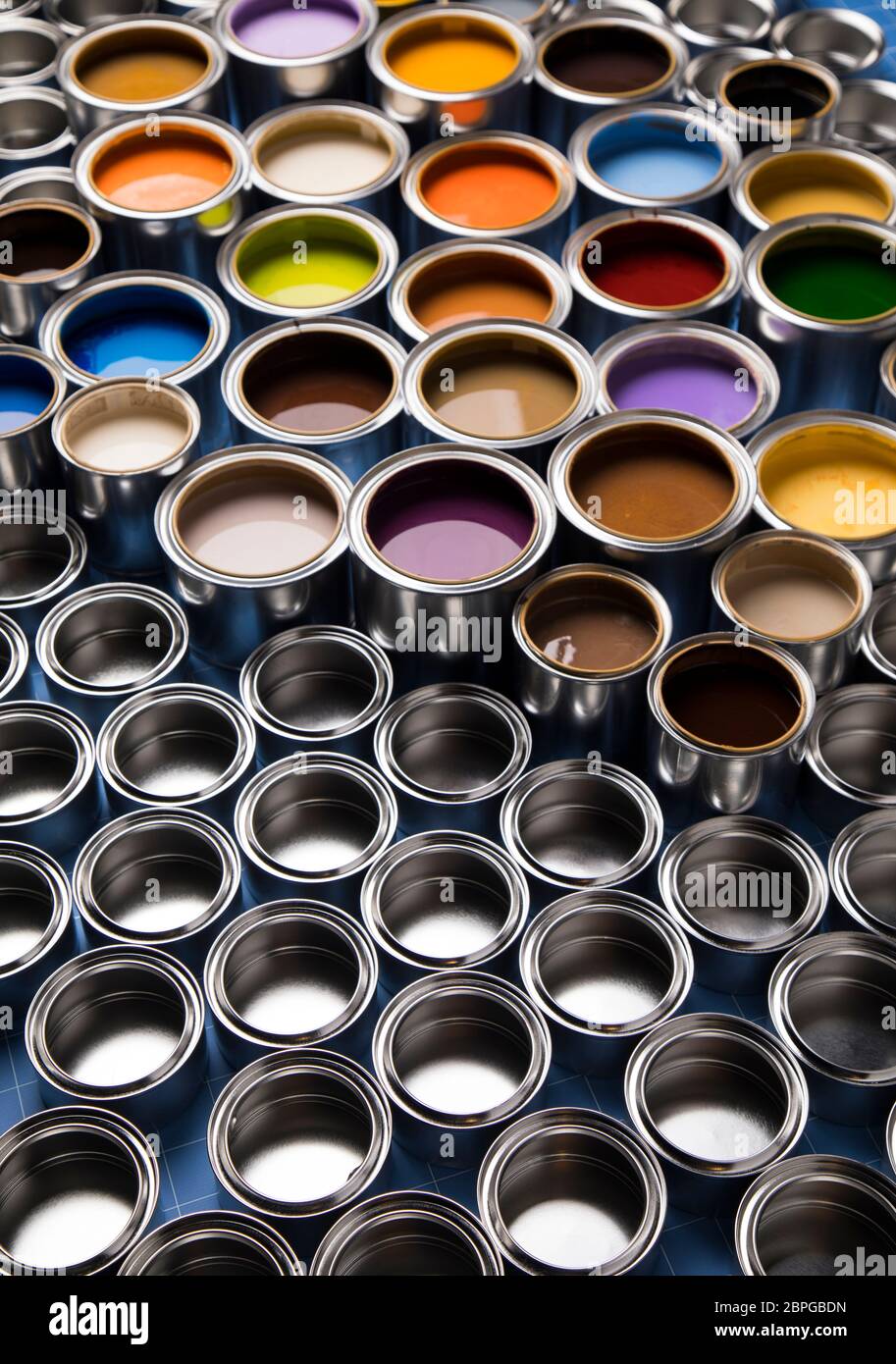 Concept group of tin metal cans with color paint Stock Photo - Alamy
