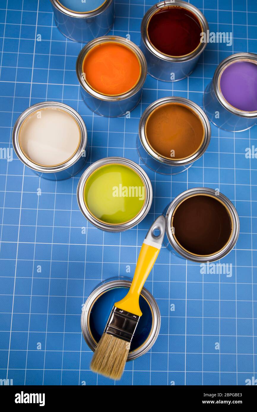 Paint brush, tin can and color guide samples, blue background Stock ...