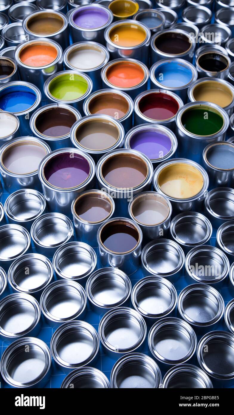 Metal cans with color paint Stock Photo - Alamy