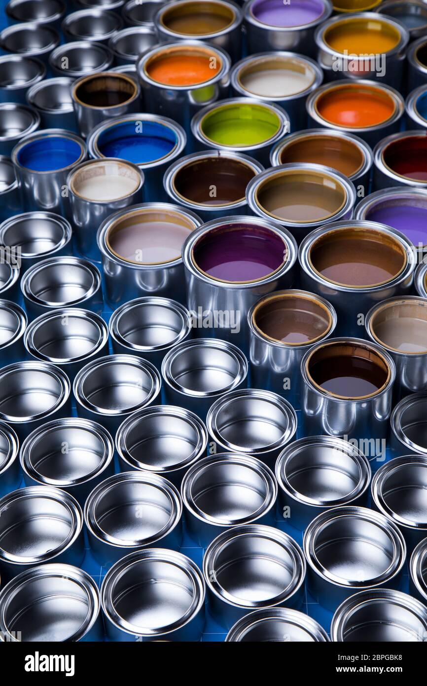 Concept group of tin metal cans with color paint Stock Photo - Alamy