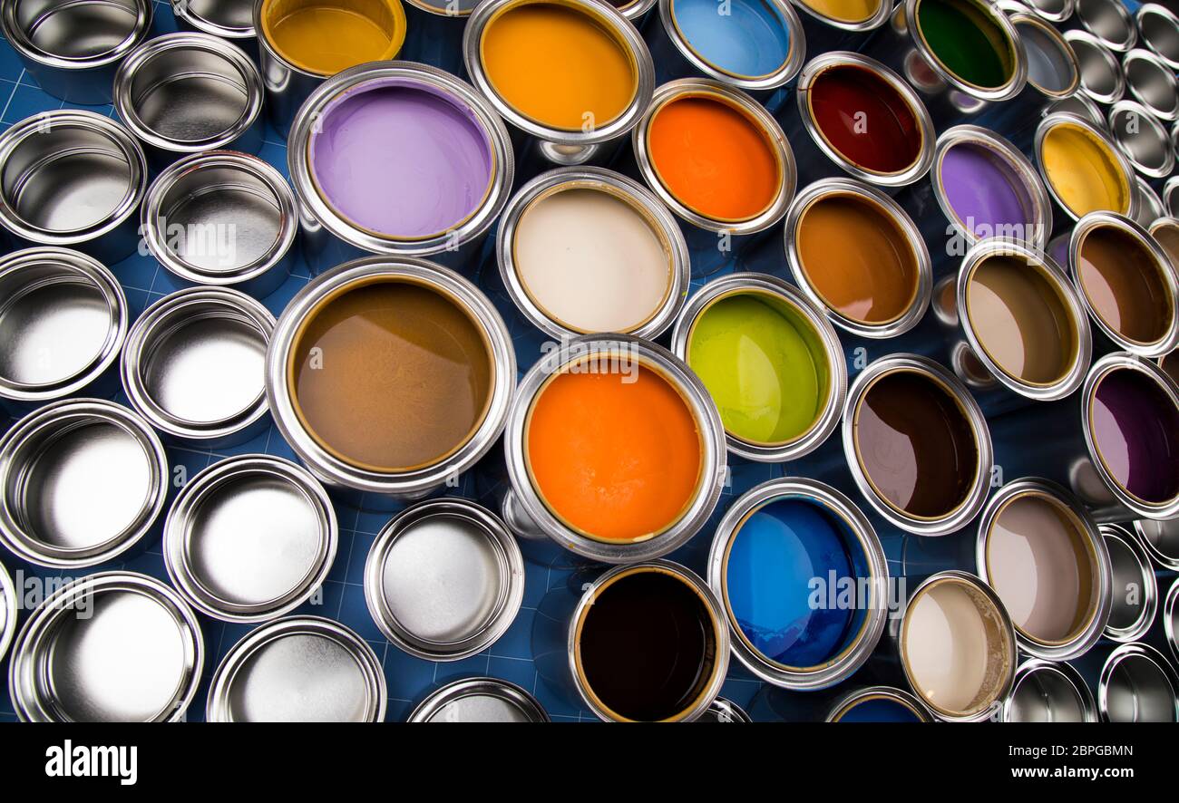 Metal cans with color paint Stock Photo - Alamy