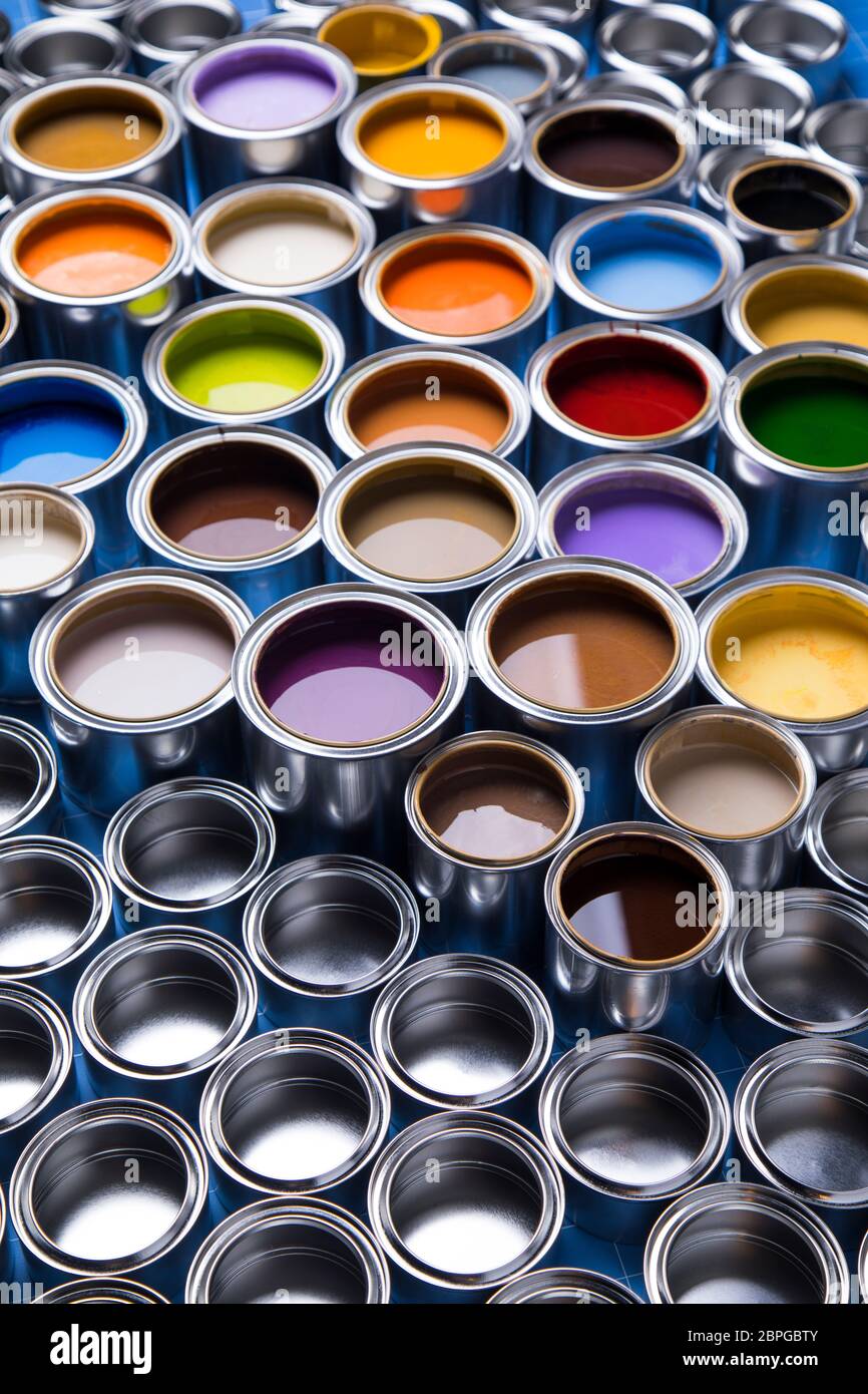 Metal cans with color paint Stock Photo - Alamy