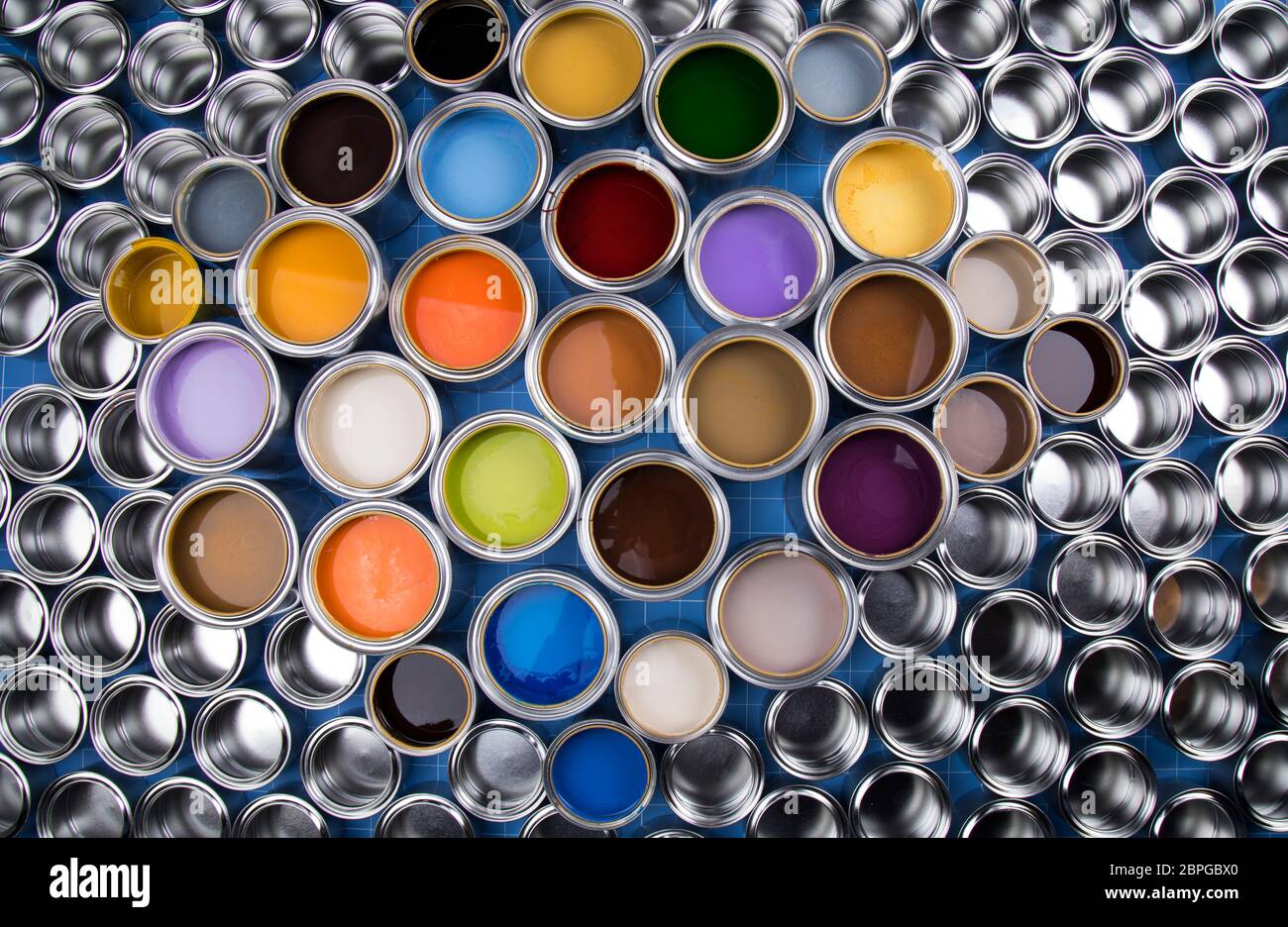 Concept group of tin metal cans with color paint Stock Photo - Alamy