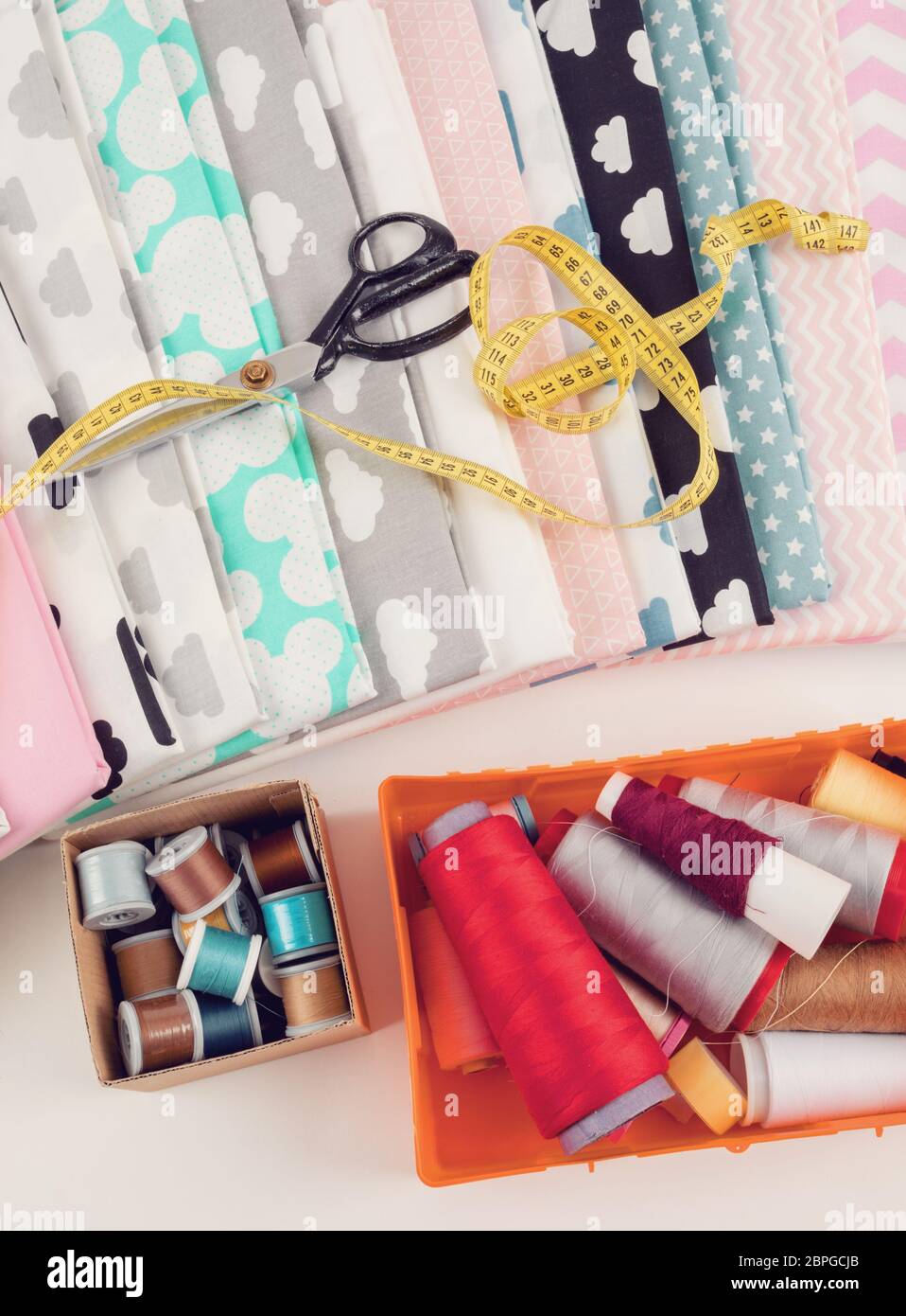 Stack of 100% cotton fabric material for tailor or homework, sewing ...