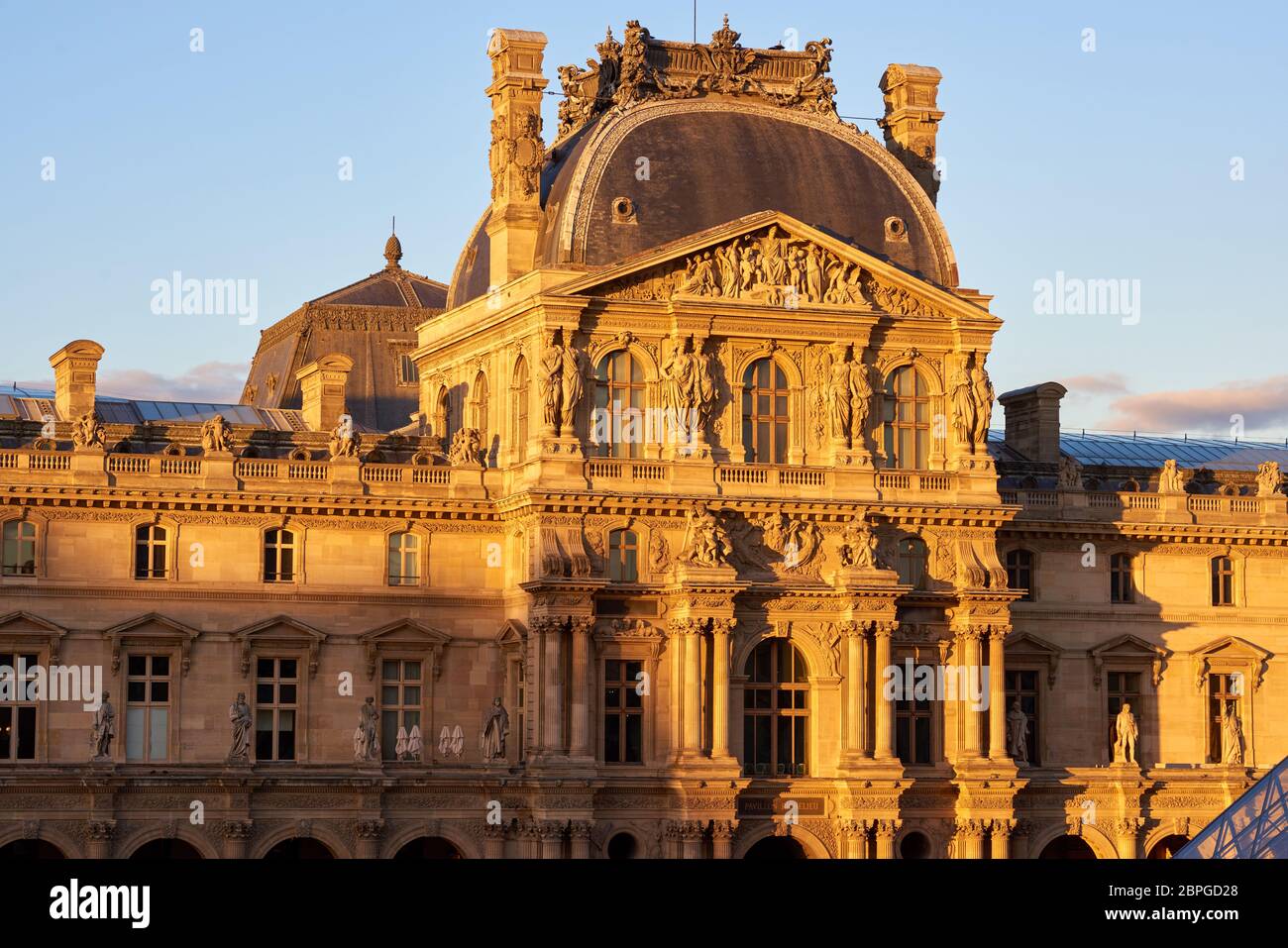 Louvre Museum facade at sunset. Paris, France Stock Photo - Alamy