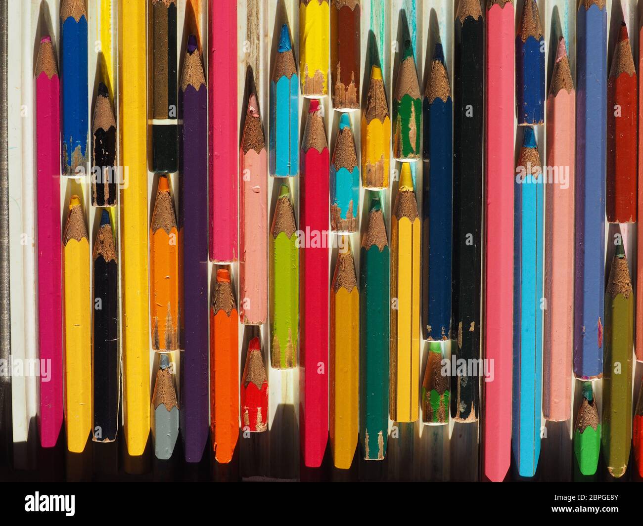colour pencils of many different colors and length Stock Photo - Alamy