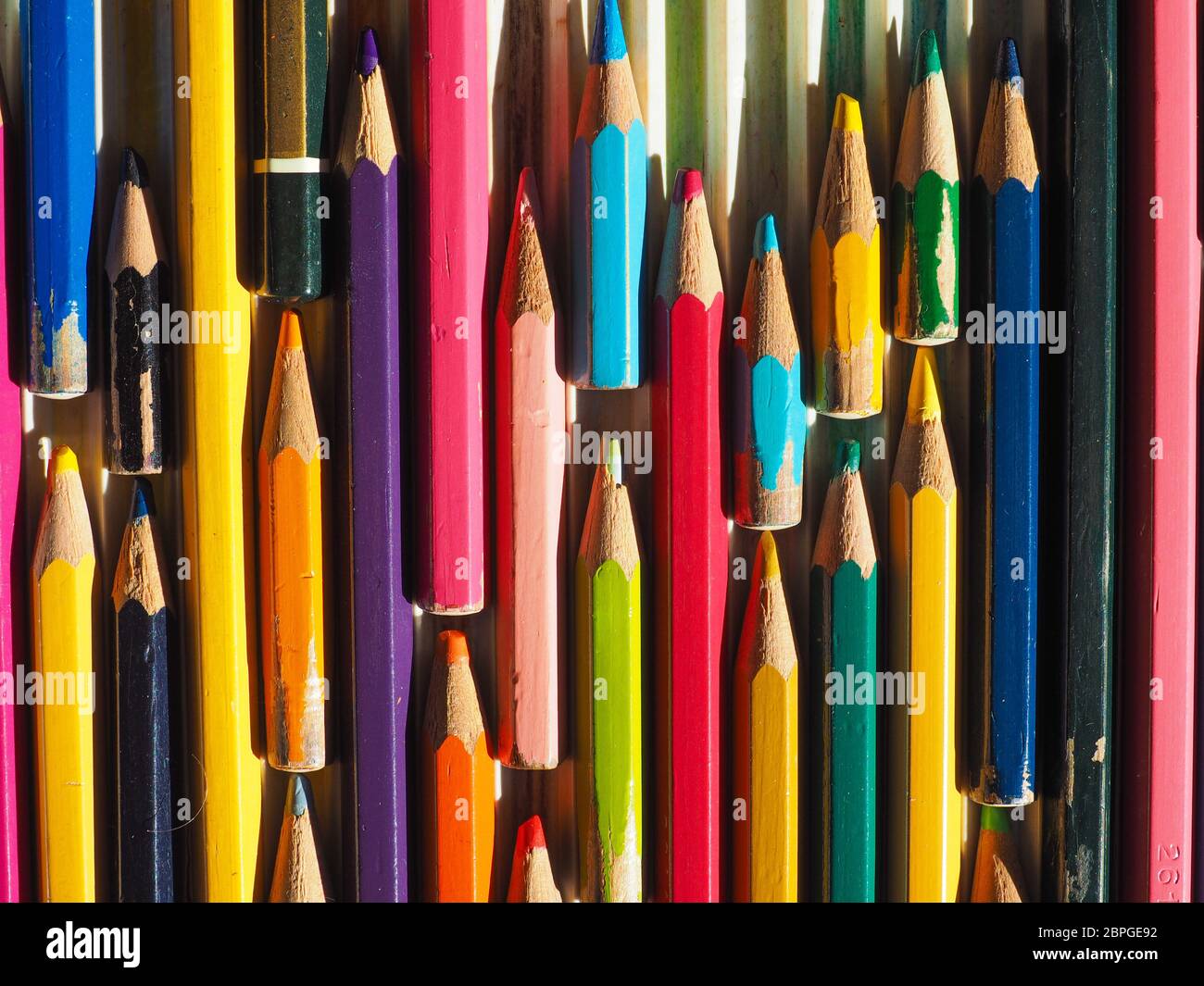 colour pencils of many different colors and length Stock Photo - Alamy