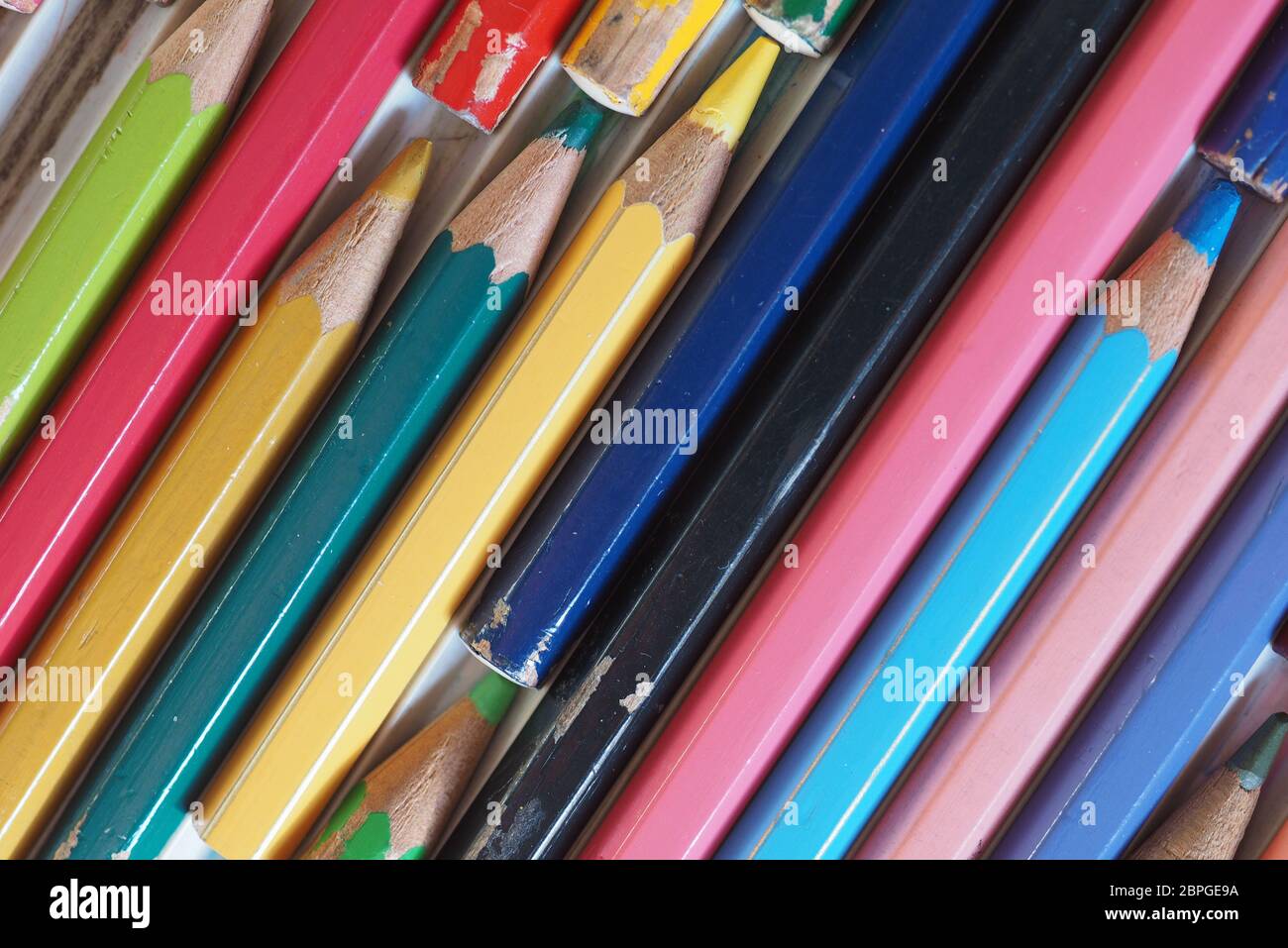colour pencils of many different colors and length Stock Photo - Alamy