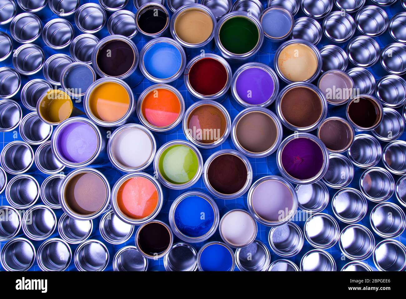 Concept group of tin metal cans with color paint Stock Photo - Alamy