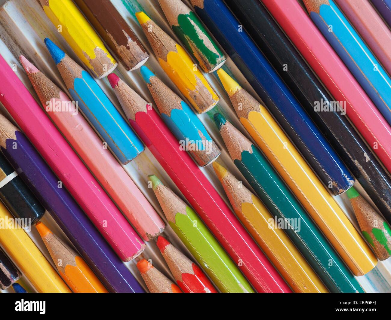 colour pencils of many different colors and length Stock Photo - Alamy