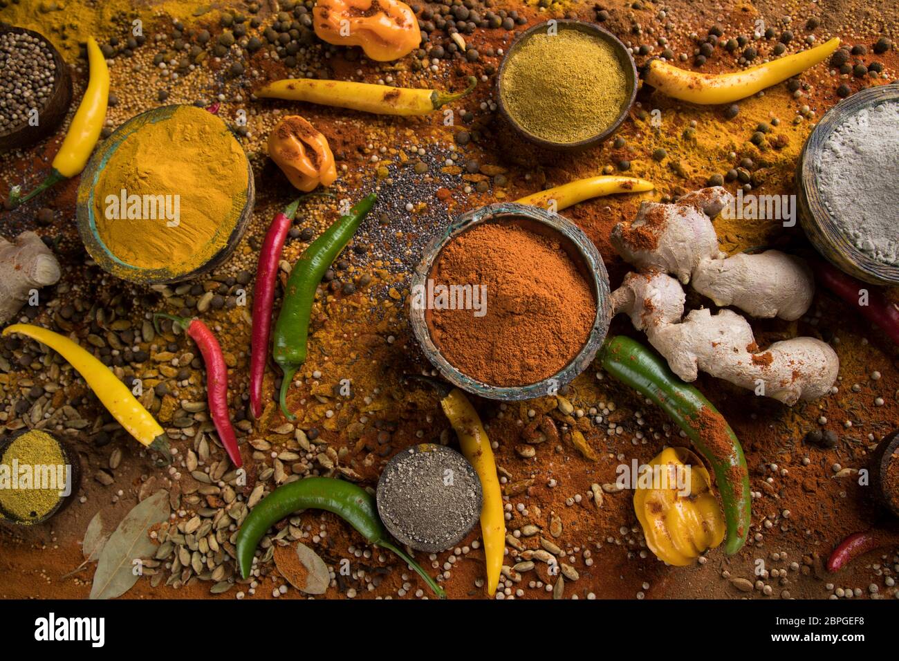 Cookbook and various spices background Stock Photo - Alamy