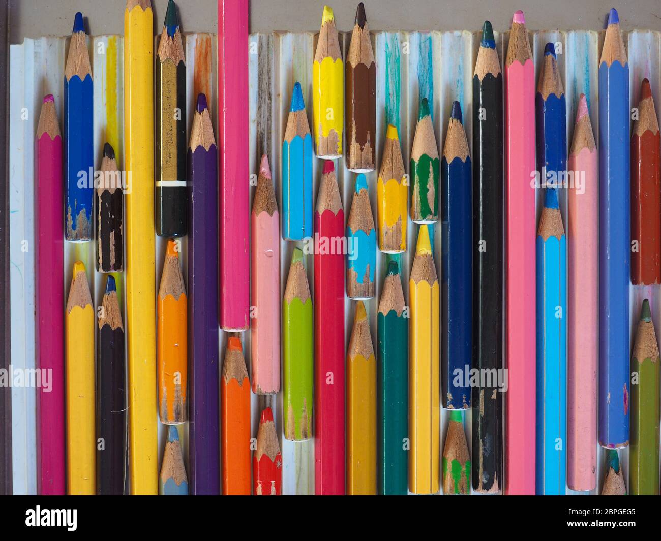 colour pencils of many different colors and length Stock Photo - Alamy