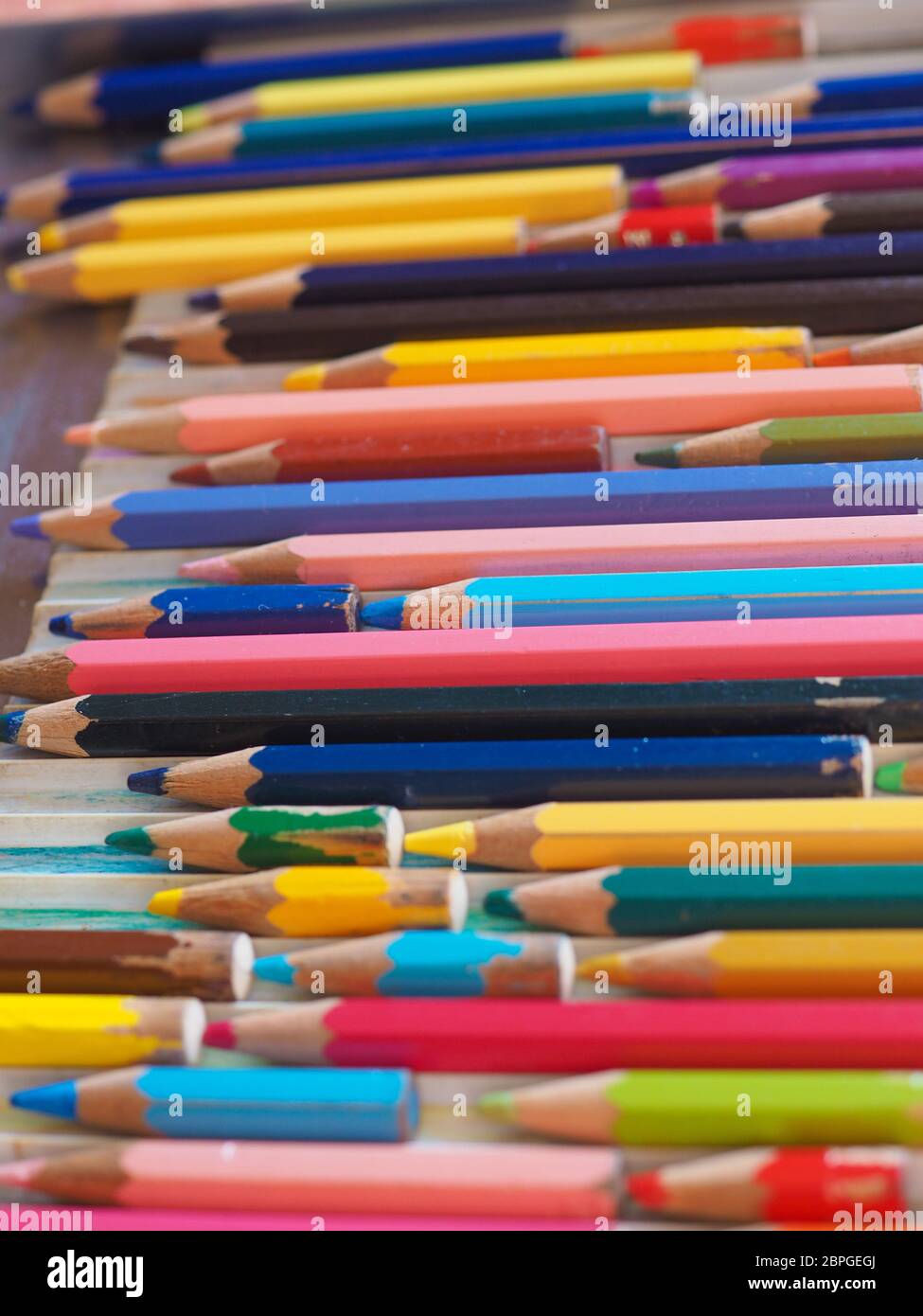 colour pencils of many different colors and length Stock Photo - Alamy