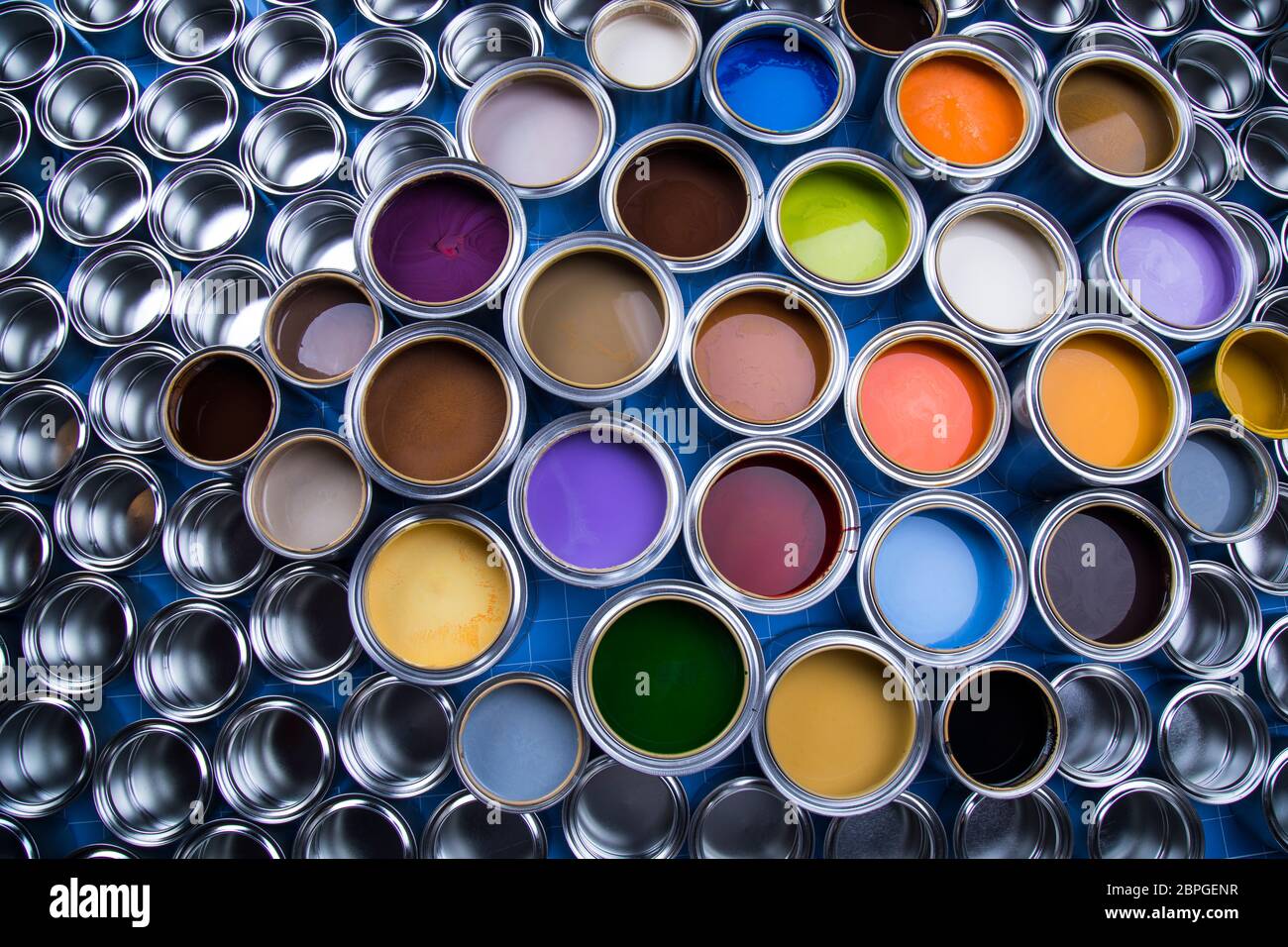 Full Buckets of rainbow colored oil paint Stock Photo - Alamy