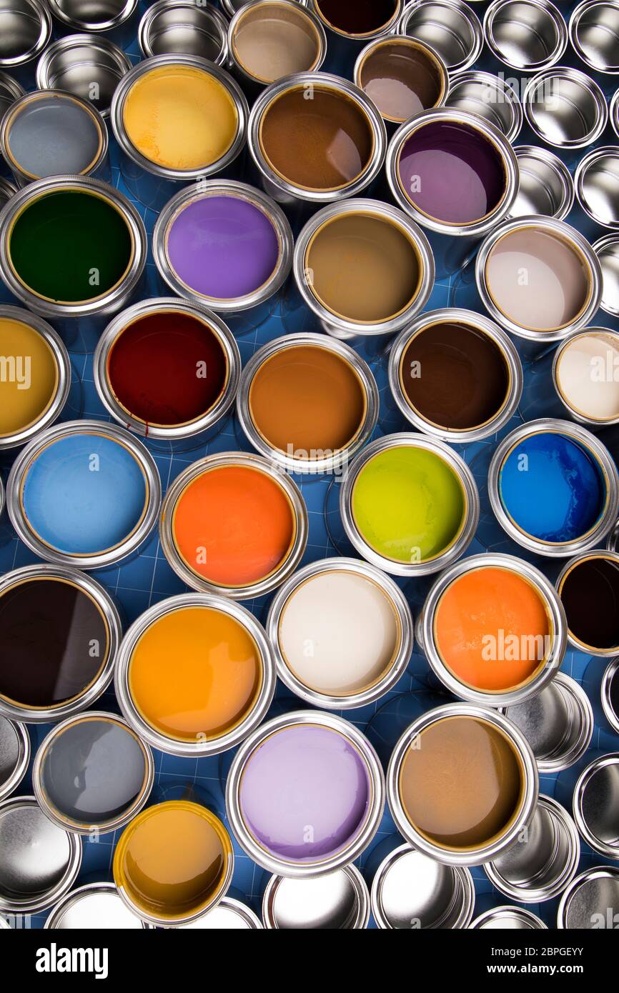 Metal cans with color paint Stock Photo - Alamy