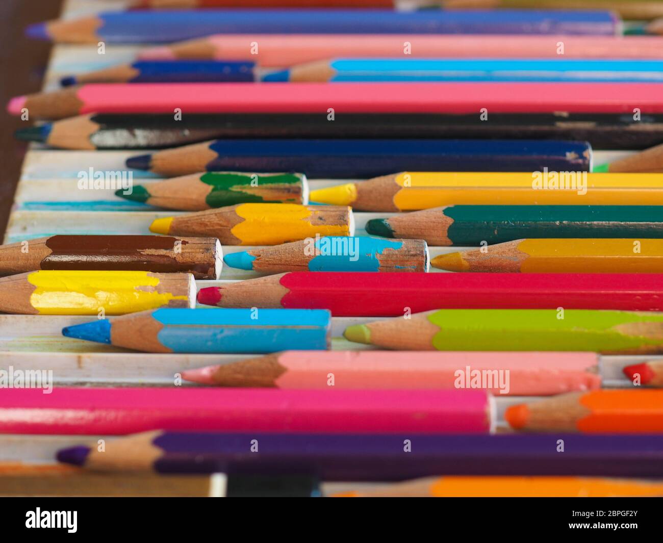 colour pencils of many different colors and length Stock Photo - Alamy