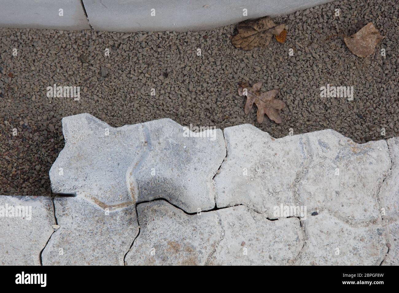 fragment of unfinished sidewalk with curved pavement bricks Stock Photo ...