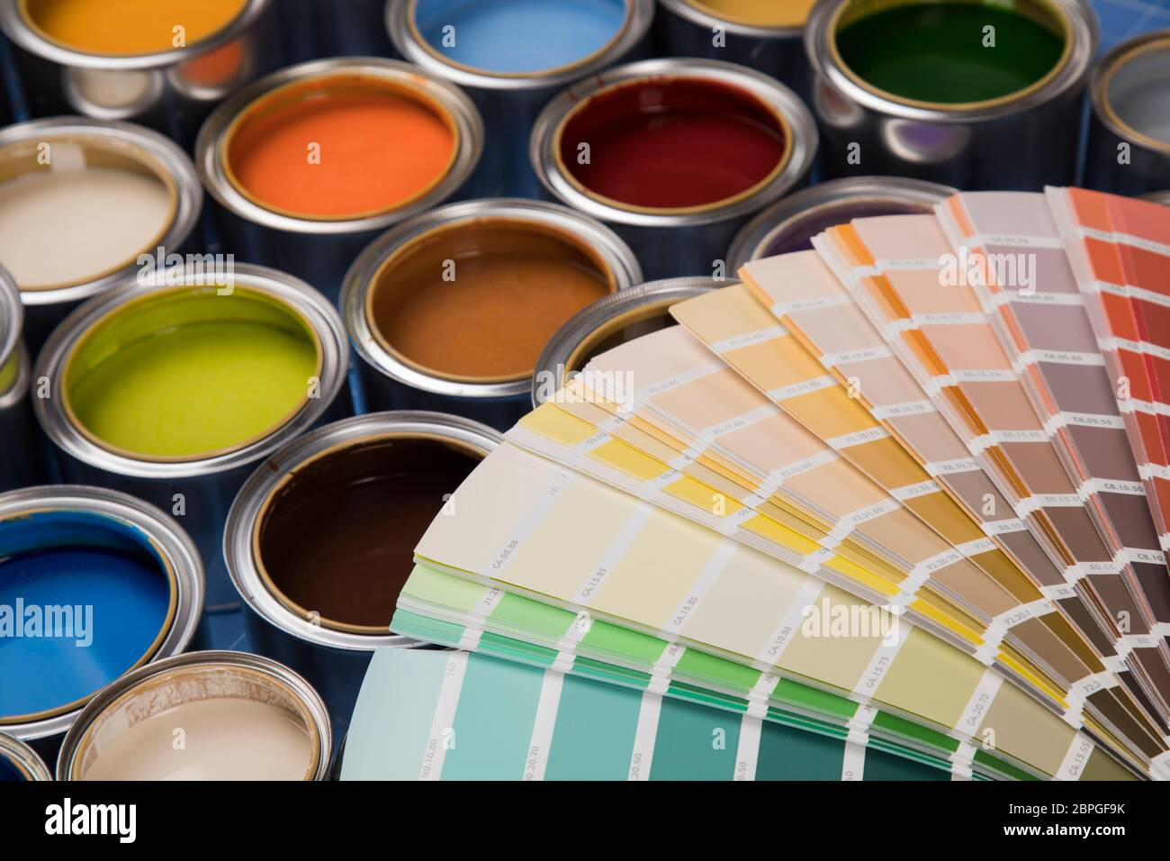 Metal cans with color paint Stock Photo - Alamy