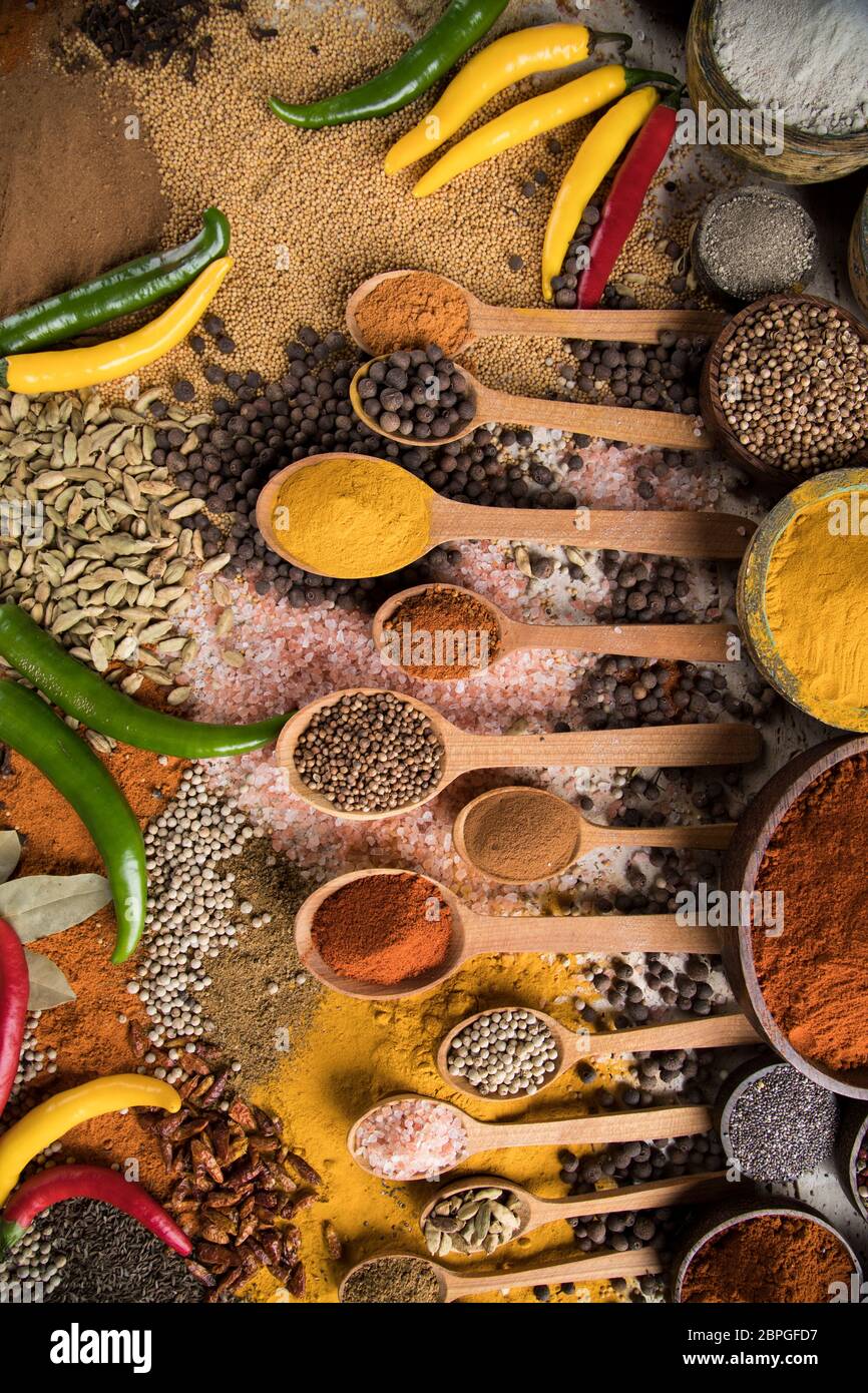 Cookbook and various spices background Stock Photo - Alamy