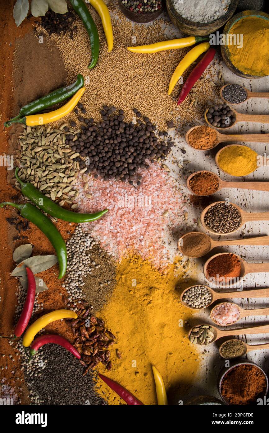 Cookbook and various spices background Stock Photo - Alamy