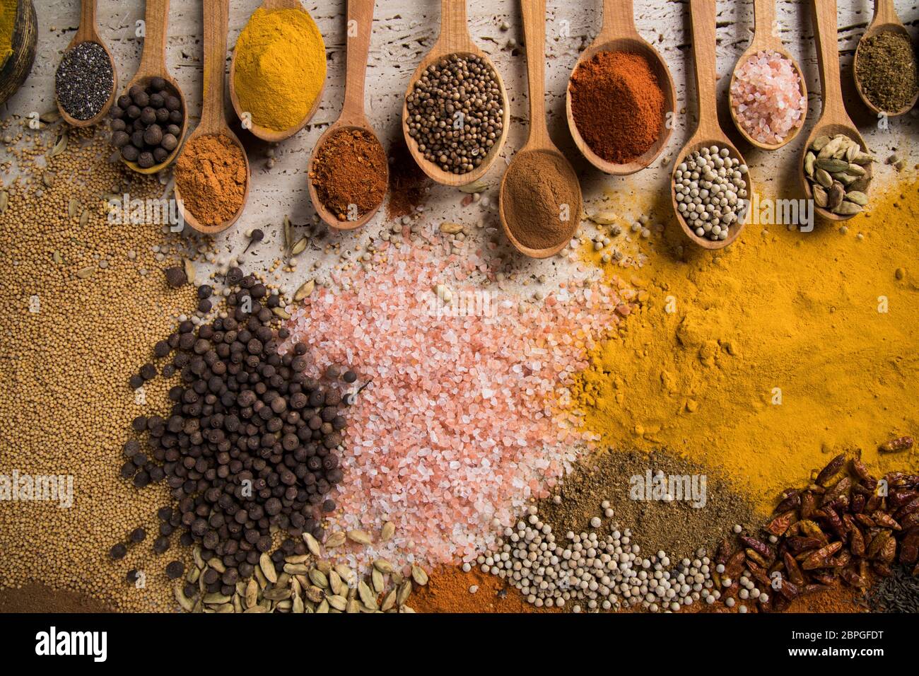 Cookbook and various spices background Stock Photo - Alamy