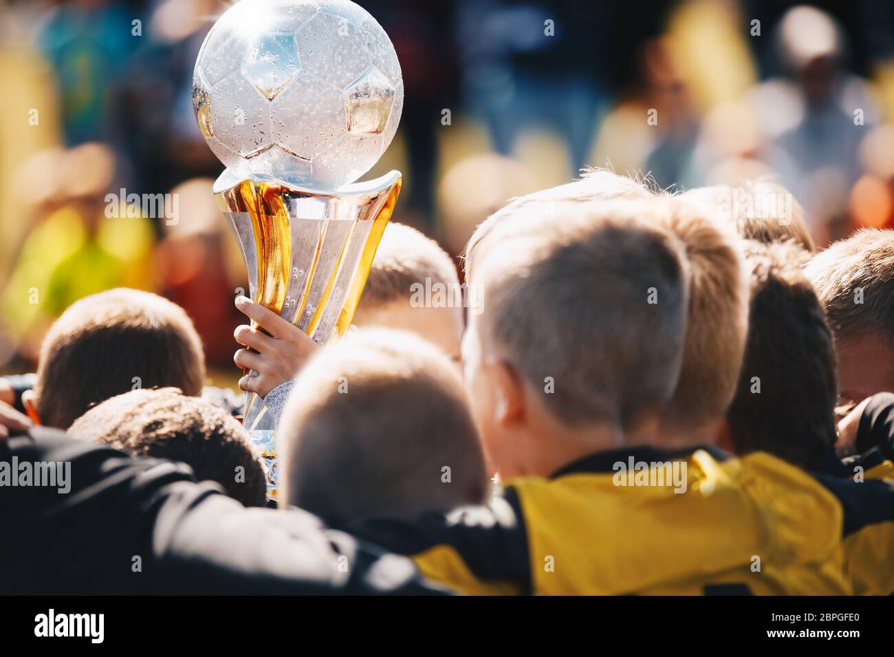 Kids Sport Team with Trophy. Kids Celebrating Football Championship ...