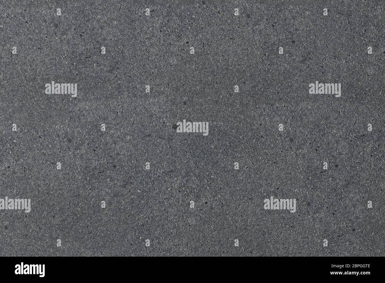 Grey asphalt road grainy detailed background Stock Photo - Alamy